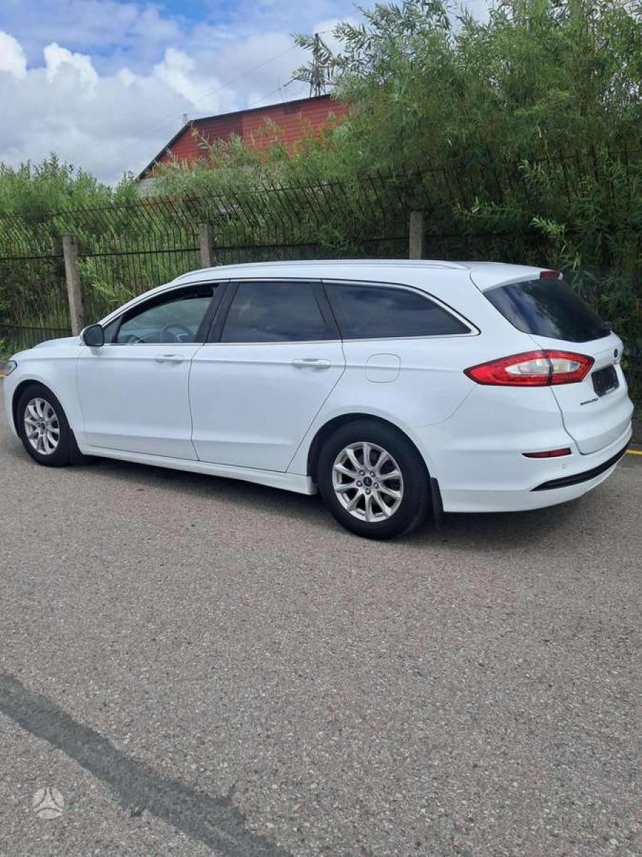 White Ford Mondeo 2015 in Kaunas, with an engine capacity of 1.56 L and mileage of 227 thousand km for 4990 €, photo 11 on AUTOMOTO.COM.LV