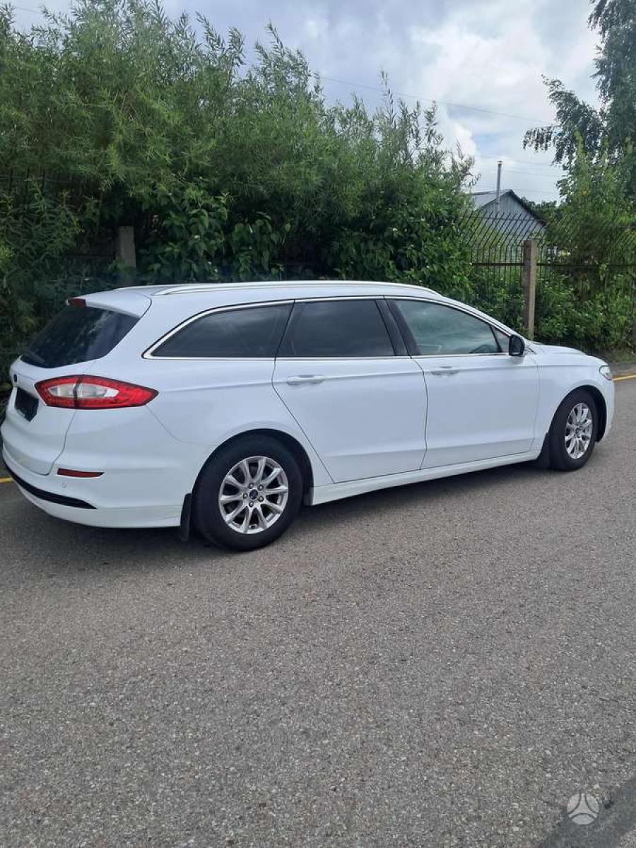 White Ford Mondeo 2015 in Kaunas, with an engine capacity of 1.56 L and mileage of 227 thousand km for 4990 €, photo 12 on AUTOMOTO.COM.LV