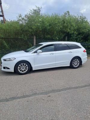 White Ford Mondeo 2015 in Kaunas, with an engine capacity of 1.56 L and mileage of 227 thousand km for 4990 €, photo 14 on AUTOMOTO.COM.LV