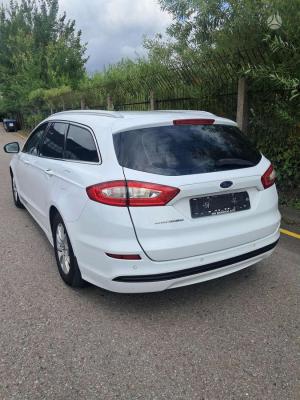 White Ford Mondeo 2015 in Kaunas, with an engine capacity of 1.56 L and mileage of 227 thousand km for 4990 €, photo 15 on AUTOMOTO.COM.LV