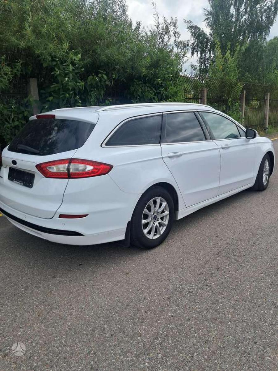 White Ford Mondeo 2015 in Kaunas, with an engine capacity of 1.56 L and mileage of 227 thousand km for 4990 €, photo 17 on AUTOMOTO.COM.LV