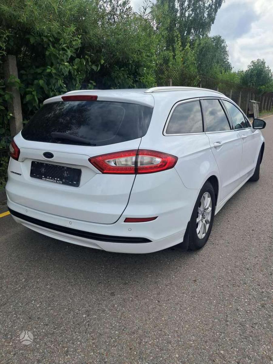 White Ford Mondeo 2015 in Kaunas, with an engine capacity of 1.56 L and mileage of 227 thousand km for 4990 €, photo 18 on AUTOMOTO.COM.LV