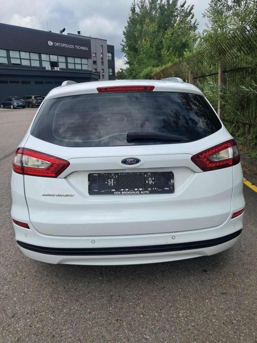 White Ford Mondeo 2015 in Kaunas, with an engine capacity of 1.56 L and mileage of 227 thousand km for 4990 €, photo 19 on AUTOMOTO.COM.LV