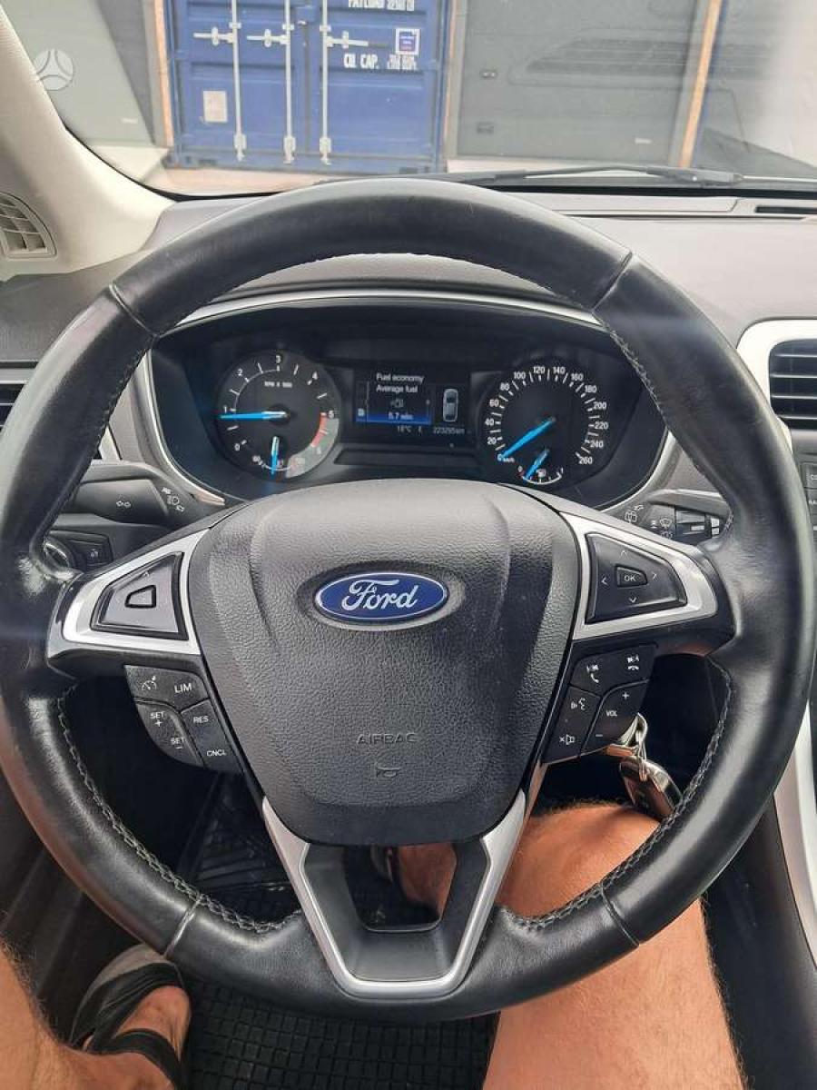 White Ford Mondeo 2015 in Kaunas, with an engine capacity of 1.56 L and mileage of 227 thousand km for 4990 €, photo 21 on AUTOMOTO.COM.LV