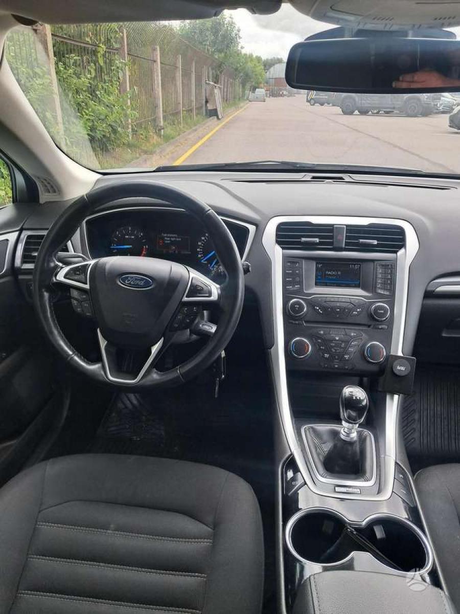 White Ford Mondeo 2015 in Kaunas, with an engine capacity of 1.56 L and mileage of 227 thousand km for 4990 €, photo 22 on AUTOMOTO.COM.LV