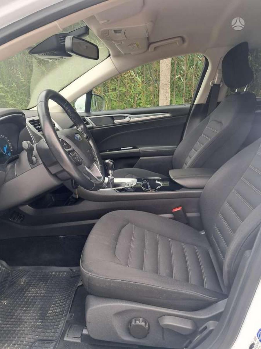 White Ford Mondeo 2015 in Kaunas, with an engine capacity of 1.56 L and mileage of 227 thousand km for 4990 €, photo 23 on AUTOMOTO.COM.LV
