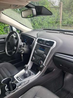 White Ford Mondeo 2015 in Kaunas, with an engine capacity of 1.56 L and mileage of 227 thousand km for 4990 €, photo 24 on AUTOMOTO.COM.LV