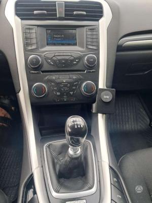 White Ford Mondeo 2015 in Kaunas, with an engine capacity of 1.56 L and mileage of 227 thousand km for 4990 €, photo 25 on AUTOMOTO.COM.LV