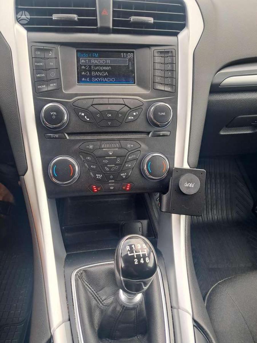 White Ford Mondeo 2015 in Kaunas, with an engine capacity of 1.56 L and mileage of 227 thousand km for 4990 €, photo 26 on AUTOMOTO.COM.LV