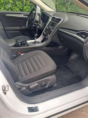 White Ford Mondeo 2015 in Kaunas, with an engine capacity of 1.56 L and mileage of 227 thousand km for 4990 €, photo 27 on AUTOMOTO.COM.LV