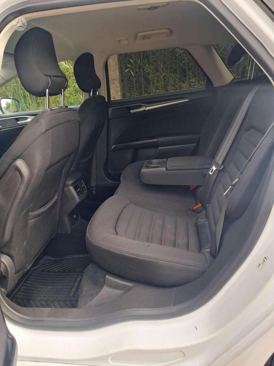 White Ford Mondeo 2015 in Kaunas, with an engine capacity of 1.56 L and mileage of 227 thousand km for 4990 €, photo 28 on AUTOMOTO.COM.LV