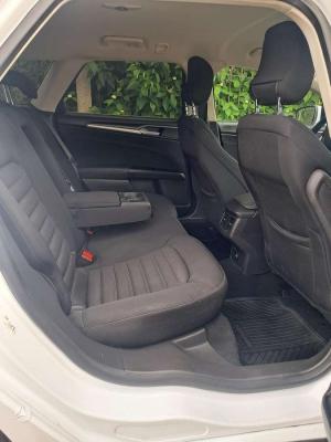 White Ford Mondeo 2015 in Kaunas, with an engine capacity of 1.56 L and mileage of 227 thousand km for 4990 €, photo 29 on AUTOMOTO.COM.LV