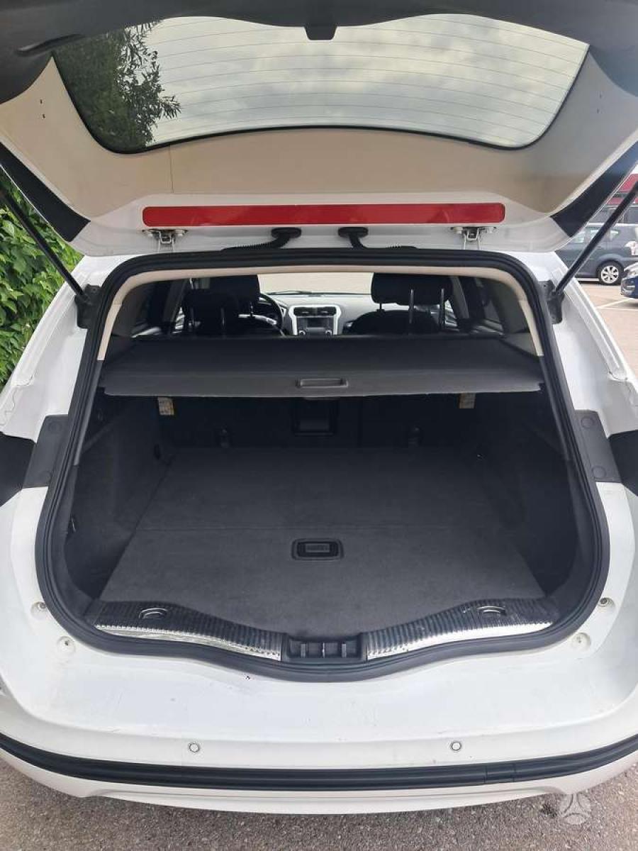 White Ford Mondeo 2015 in Kaunas, with an engine capacity of 1.56 L and mileage of 227 thousand km for 4990 €, photo 30 on AUTOMOTO.COM.LV