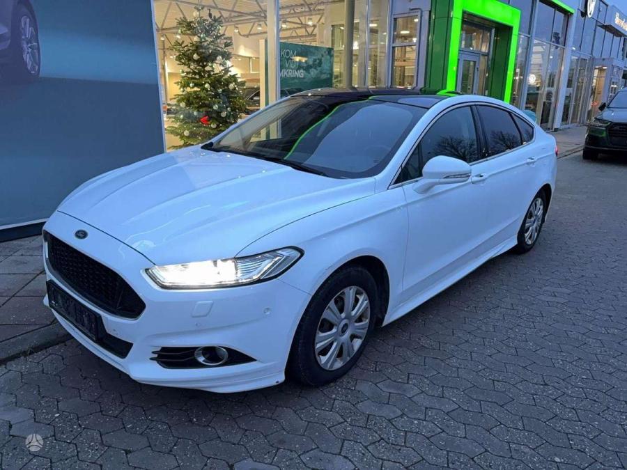 White Ford Mondeo 2016 in Kaunas, with an engine capacity of 2.00 L and mileage of 228 thousand km for 9950 €, photo 2 on AUTOMOTO.COM.LV
