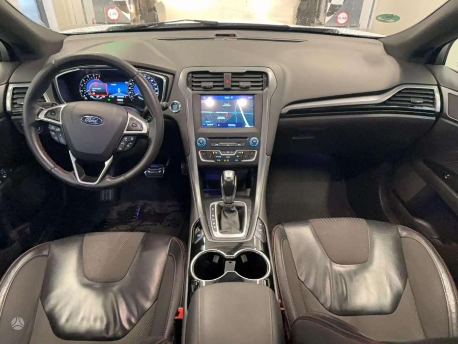 White Ford Mondeo 2017 in Kaunas, with an engine capacity of 2.00 L and mileage of 220 thousand km for 10950 €, photo 8 on AUTOMOTO.COM.LV