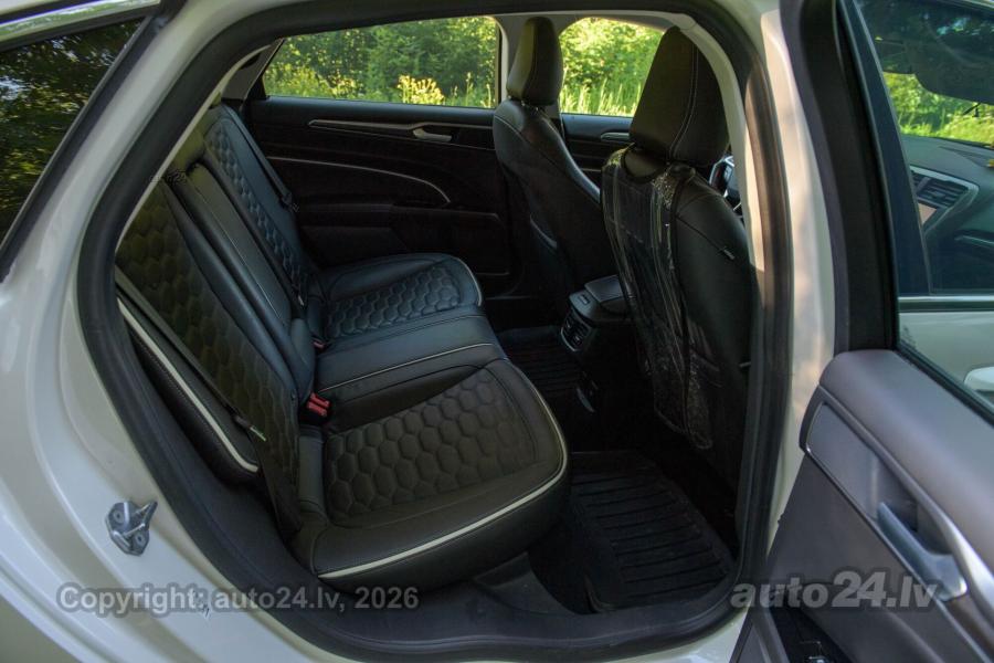 White Ford Mondeo 2019 in Tallinn, with an engine capacity of 2.00 L and mileage of 84 thousand km for 18800 €, photo 18 on AUTOMOTO.COM.LV