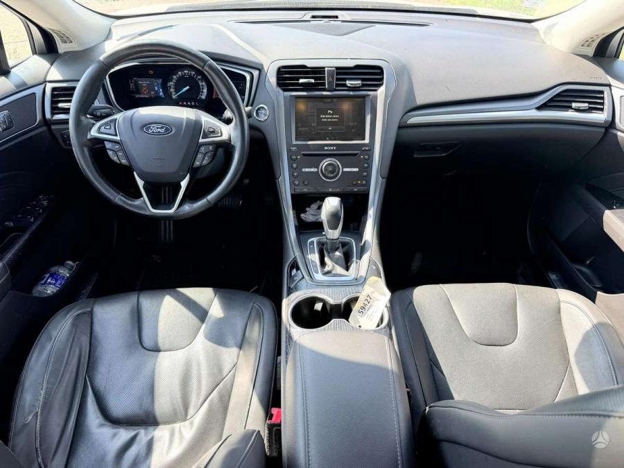 White Ford Mondeo 2015 in Taurage, with an engine capacity of 2.00 L and mileage of 330 thousand km for 4200 €, photo 7 on AUTOMOTO.COM.LV