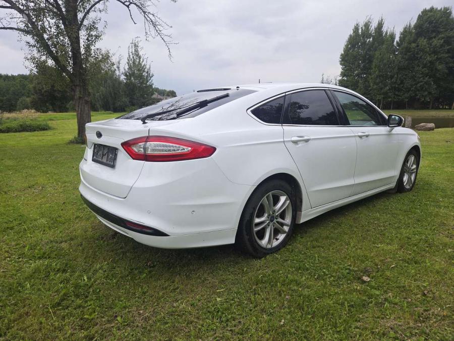 White Ford Mondeo 2016 in Alytus, with an engine capacity of 2.00 L and mileage of 247 thousand km for 5249 €, photo 5 on AUTOMOTO.COM.LV
