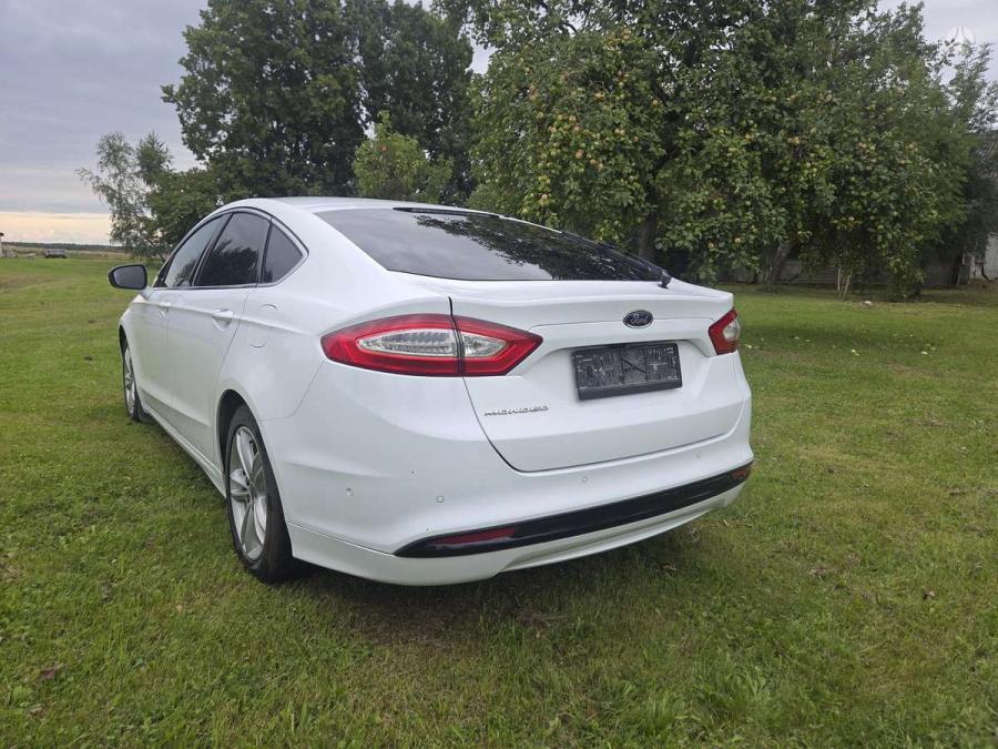 White Ford Mondeo 2016 in Alytus, with an engine capacity of 2.00 L and mileage of 247 thousand km for 5249 €, photo 6 on AUTOMOTO.COM.LV