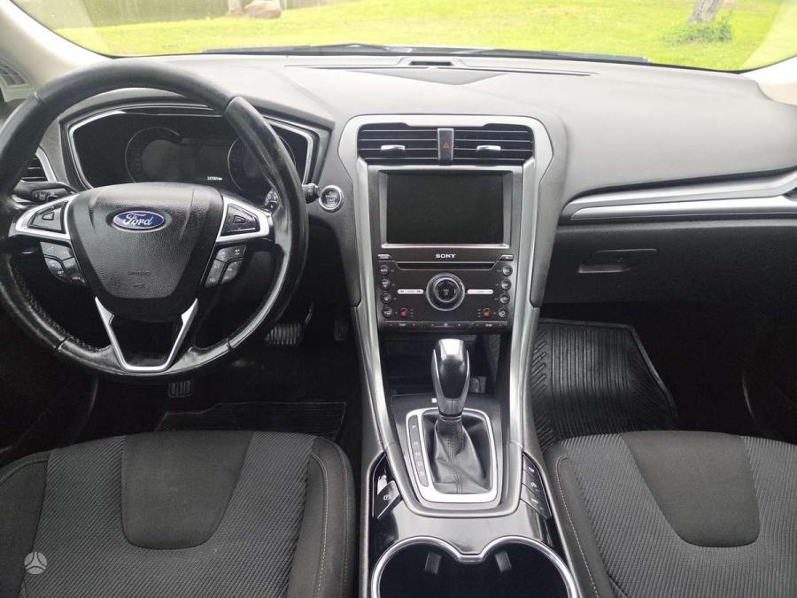 White Ford Mondeo 2016 in Alytus, with an engine capacity of 2.00 L and mileage of 247 thousand km for 5249 €, photo 10 on AUTOMOTO.COM.LV