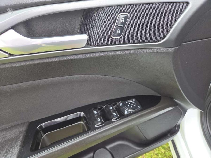 White Ford Mondeo 2016 in Alytus, with an engine capacity of 2.00 L and mileage of 247 thousand km for 5249 €, photo 12 on AUTOMOTO.COM.LV