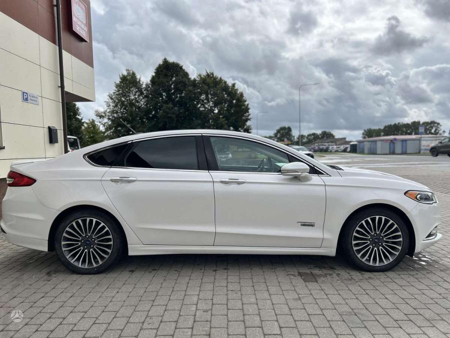White Ford Mondeo 2017 in Kretinga, with an engine capacity of 2.00 L and mileage of 159 thousand km for 12499 €, photo 8 on AUTOMOTO.COM.LV
