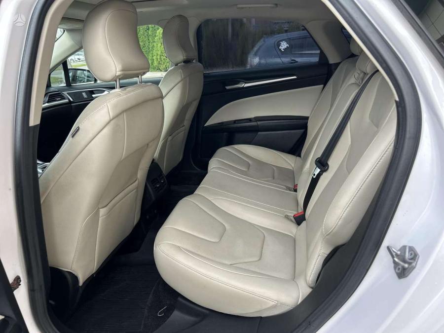 White Ford Mondeo 2017 in Kretinga, with an engine capacity of 2.00 L and mileage of 159 thousand km for 12499 €, photo 21 on AUTOMOTO.COM.LV