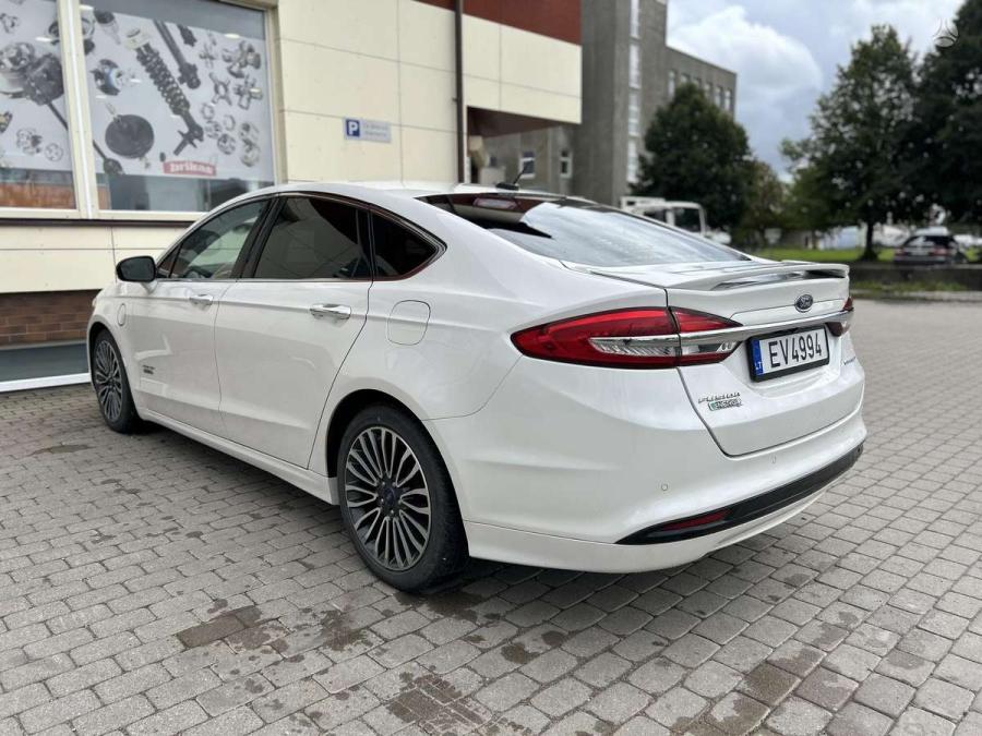 White Ford Mondeo 2020 in Kretinga, with an engine capacity of 2.00 L and mileage of 159 thousand km for 12499 €, photo 10 on AUTOMOTO.COM.LV