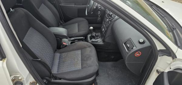 White Ford Mondeo 2007 in Riga, with an engine capacity of 2.00 L and mileage of 248 thousand km for 1100 €, photo 6 on AUTOMOTO.COM.LV