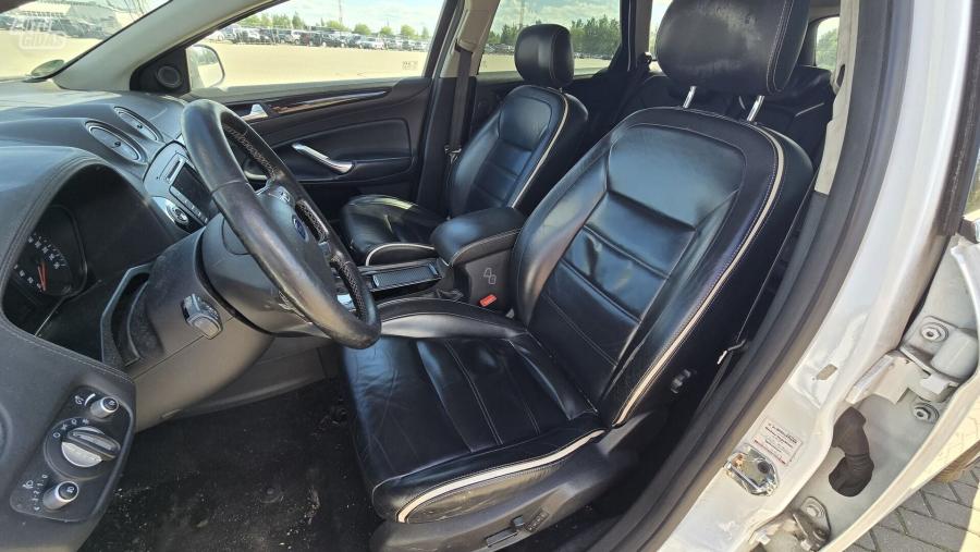 White Ford Mondeo 2013 in Marijampole, with an engine capacity of 2.20 L and mileage of 255 thousand km for 2150 €, photo 12 on AUTOMOTO.COM.LV