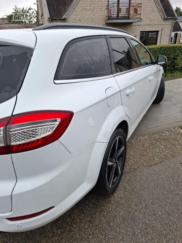 White Ford Mondeo 2013 in Birzai, with an engine capacity of 2.00 L and mileage of 291 thousand km for 3500 €, photo 9 on AUTOMOTO.COM.LV