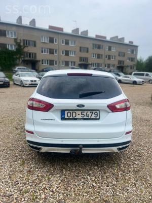 White Ford Mondeo 2014 in Kuldiga, with an engine capacity of 2.00 L and mileage of 299 thousand km for 6390 €, photo 5 on AUTOMOTO.COM.LV