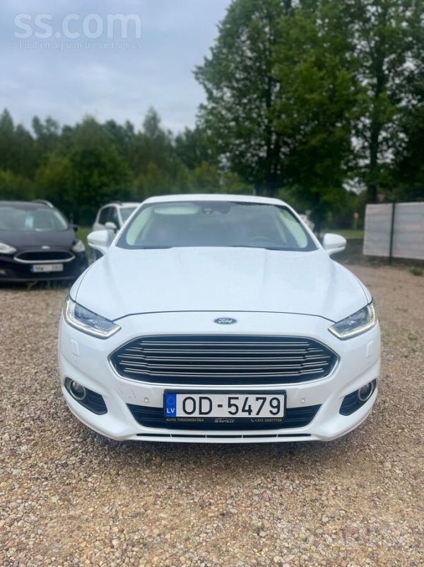 White Ford Mondeo 2014 in Kuldiga, with an engine capacity of 2.00 L and mileage of 299 thousand km for 6190 €, photo 6 on AUTOMOTO.COM.LV