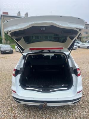 White Ford Mondeo 2014 in Kuldiga, with an engine capacity of 2.00 L and mileage of 299 thousand km for 6390 €, photo 9 on AUTOMOTO.COM.LV