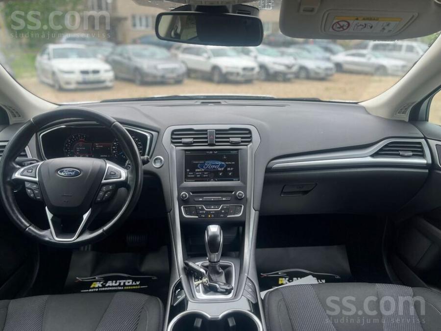 White Ford Mondeo 2014 in Kuldiga, with an engine capacity of 2.00 L and mileage of 299 thousand km for 6390 €, photo 13 on AUTOMOTO.COM.LV