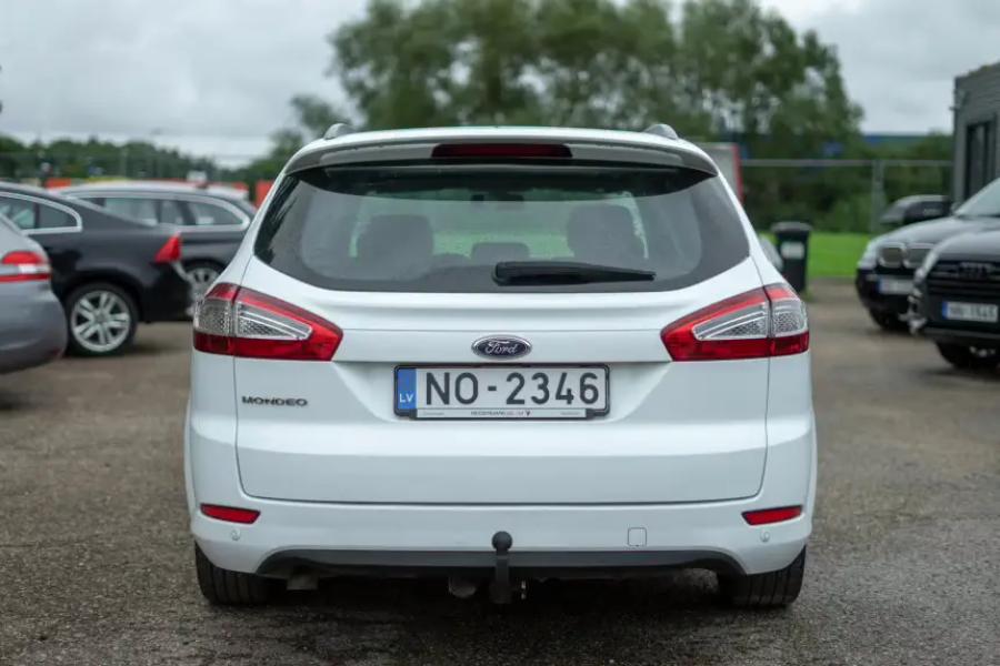 White Ford Mondeo 2014 in Liepaja, with an engine capacity of 1.60 L and mileage of 329 thousand km for 5950 €, photo 4 on AUTOMOTO.COM.LV