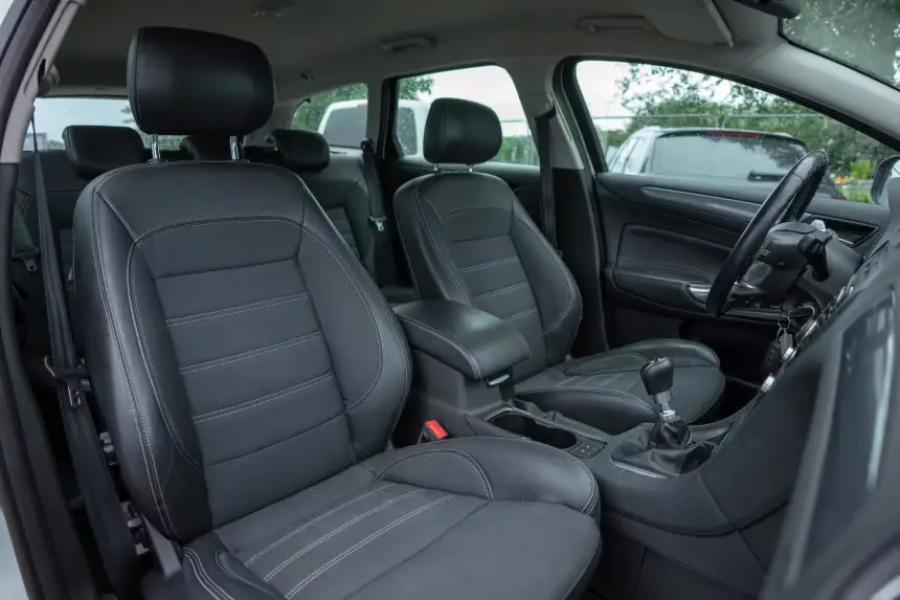 White Ford Mondeo 2014 in Liepaja, with an engine capacity of 1.60 L and mileage of 329 thousand km for 5950 €, photo 14 on AUTOMOTO.COM.LV