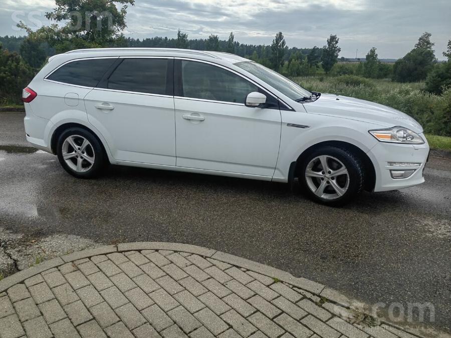 White Ford Mondeo 2014 in Ogre, with an engine capacity of 2.00 L and mileage of 352 thousand km for 4199 €, photo 3 on AUTOMOTO.COM.LV
