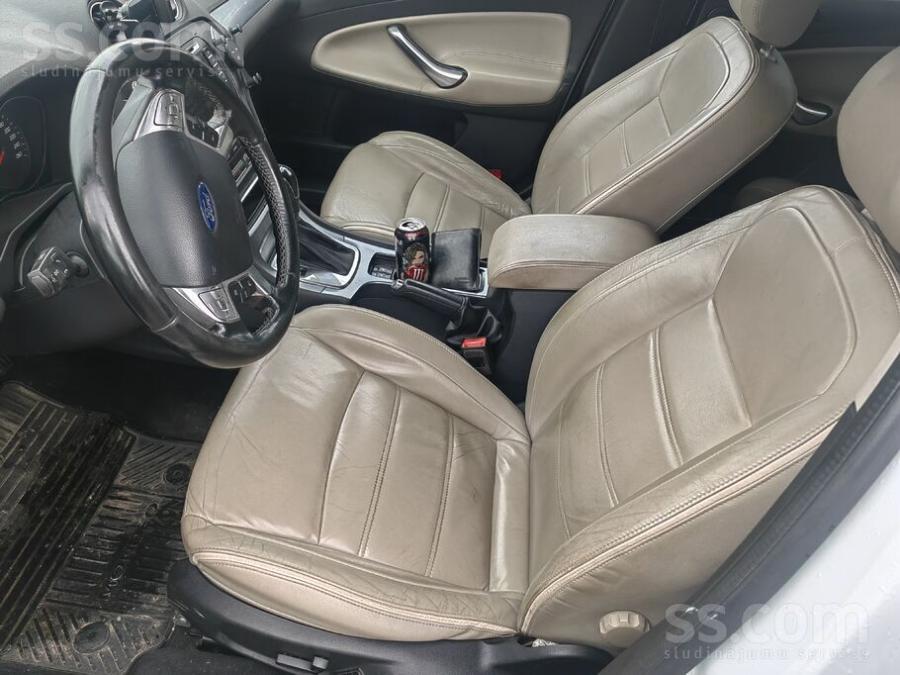 White Ford Mondeo 2014 in Ogre, with an engine capacity of 2.00 L and mileage of 352 thousand km for 4199 €, photo 7 on AUTOMOTO.COM.LV