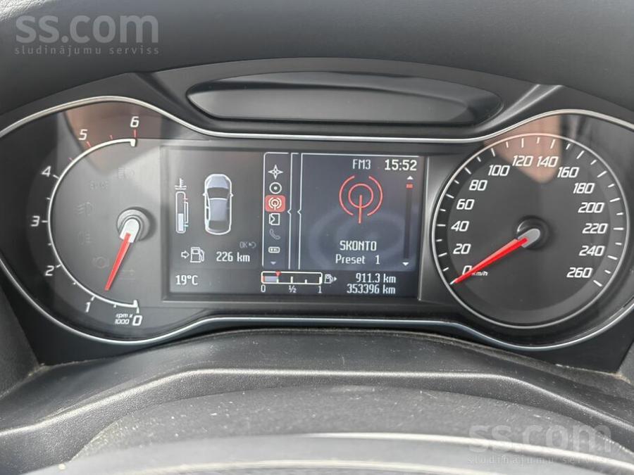 White Ford Mondeo 2014 in Ogre, with an engine capacity of 2.00 L and mileage of 352 thousand km for 4199 €, photo 10 on AUTOMOTO.COM.LV