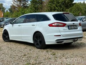 White Ford Mondeo 2014 in Kuldiga, with an engine capacity of 2.00 L and mileage of 299 thousand km for 6390 €, photo 4 on AUTOMOTO.COM.LV