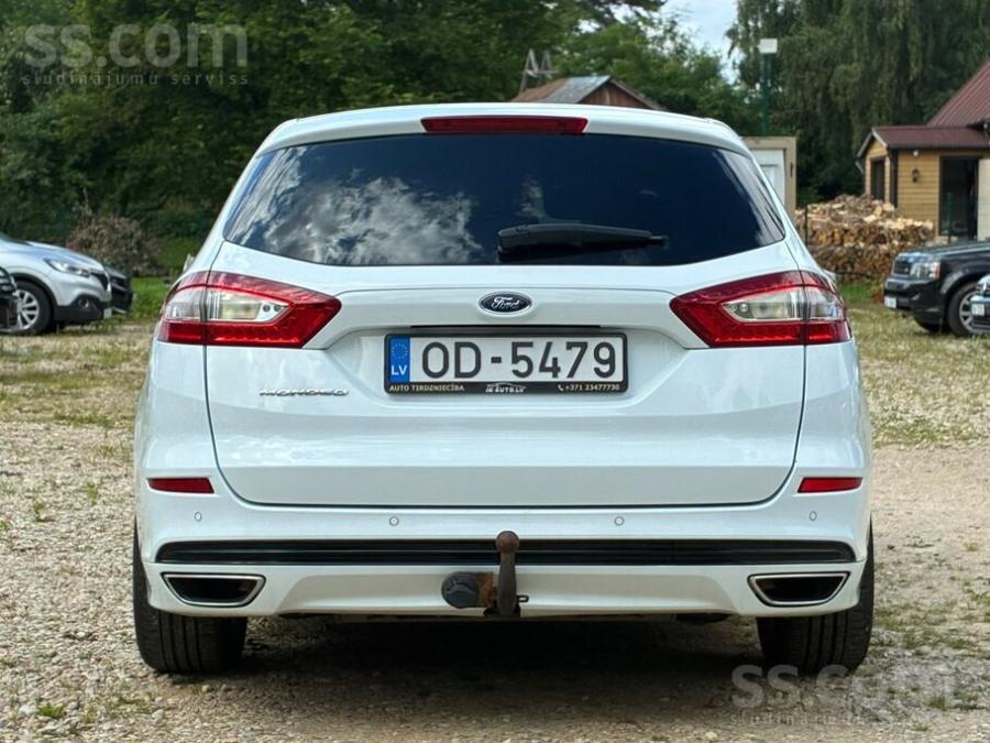 White Ford Mondeo 2014 in Kuldiga, with an engine capacity of 2.00 L and mileage of 299 thousand km for 6390 €, photo 9 on AUTOMOTO.COM.LV