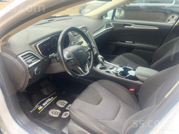 White Ford Mondeo 2014 in Kuldiga, with an engine capacity of 2.00 L and mileage of 299 thousand km for 6390 €, photo 9 on AUTOMOTO.COM.LV