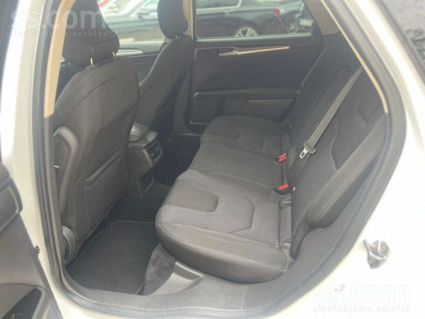 White Ford Mondeo 2014 in Kuldiga, with an engine capacity of 2.00 L and mileage of 299 thousand km for 6390 €, photo 10 on AUTOMOTO.COM.LV