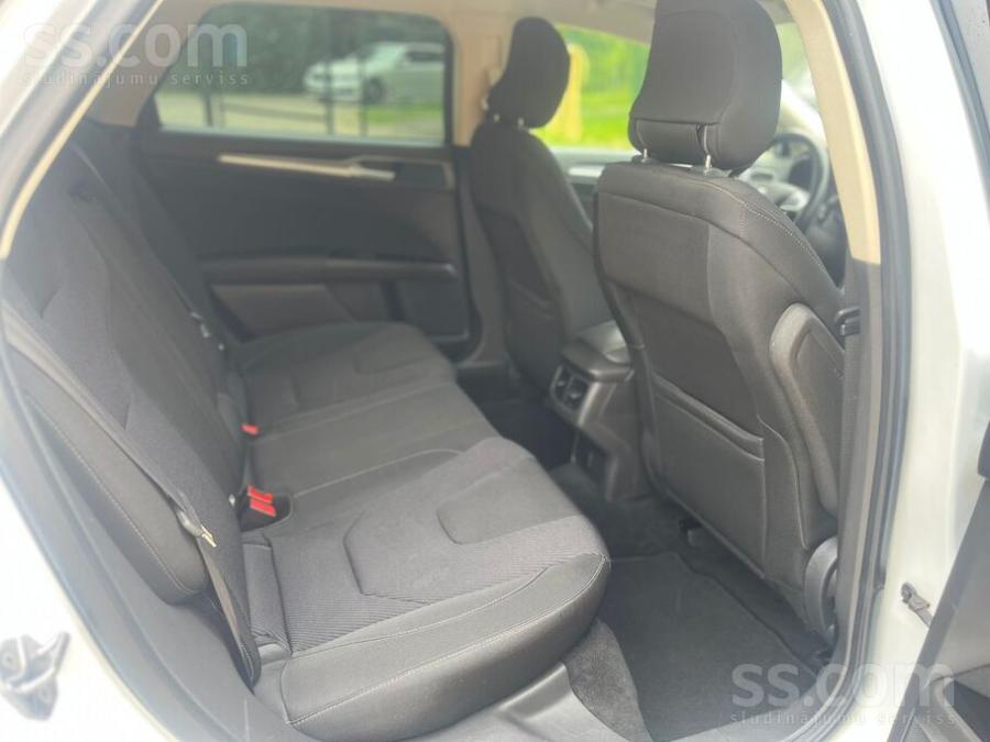 White Ford Mondeo 2014 in Kuldiga, with an engine capacity of 2.00 L and mileage of 299 thousand km for 6390 €, photo 12 on AUTOMOTO.COM.LV