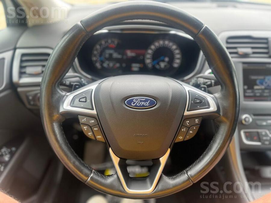 White Ford Mondeo 2014 in Kuldiga, with an engine capacity of 2.00 L and mileage of 299 thousand km for 6390 €, photo 15 on AUTOMOTO.COM.LV