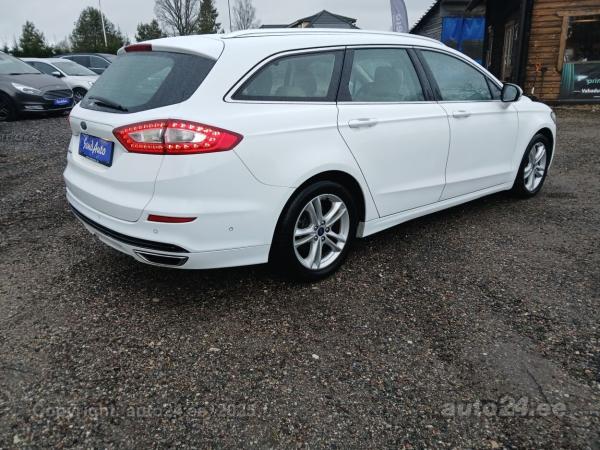 White Ford Mondeo 2015 in Tartu, with an engine capacity of 2.00 L and mileage of 223 thousand km for 7990 €, photo 5 on AUTOMOTO.COM.LV