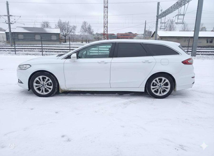 White Ford Mondeo 2015 in Siauliai, with an engine capacity of 2.00 L and mileage of 298 thousand km for 5750 €, photo 7 on AUTOMOTO.COM.LV
