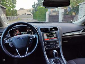 White Ford Mondeo 2015 in Marijampole, with an engine capacity of 2.00 L and mileage of 261 thousand km for 6800 €, photo 14 on AUTOMOTO.COM.LV