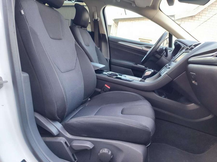 White Ford Mondeo 2015 in Marijampole, with an engine capacity of 2.00 L and mileage of 261 thousand km for 6800 €, photo 16 on AUTOMOTO.COM.LV